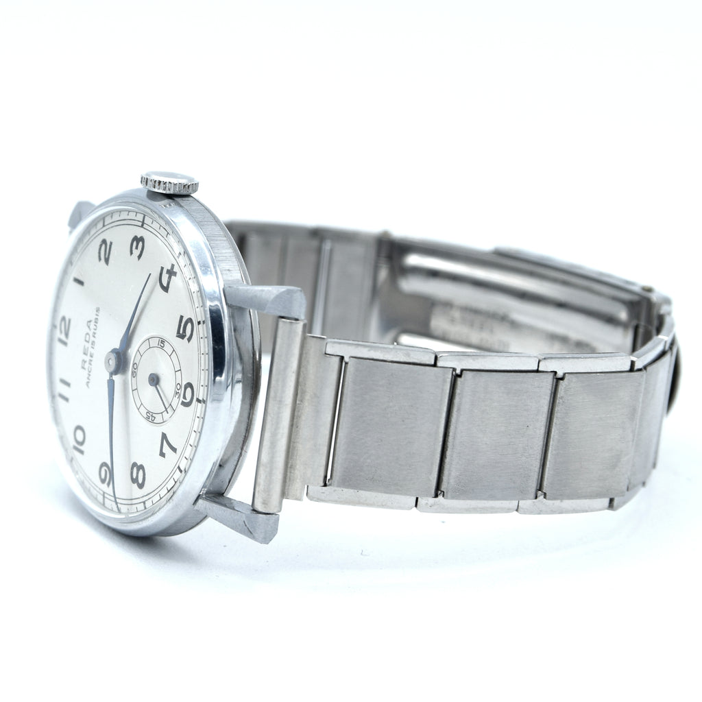 1940s New old stock unused Reda swiss wristwatch with fancy lugs on un ...