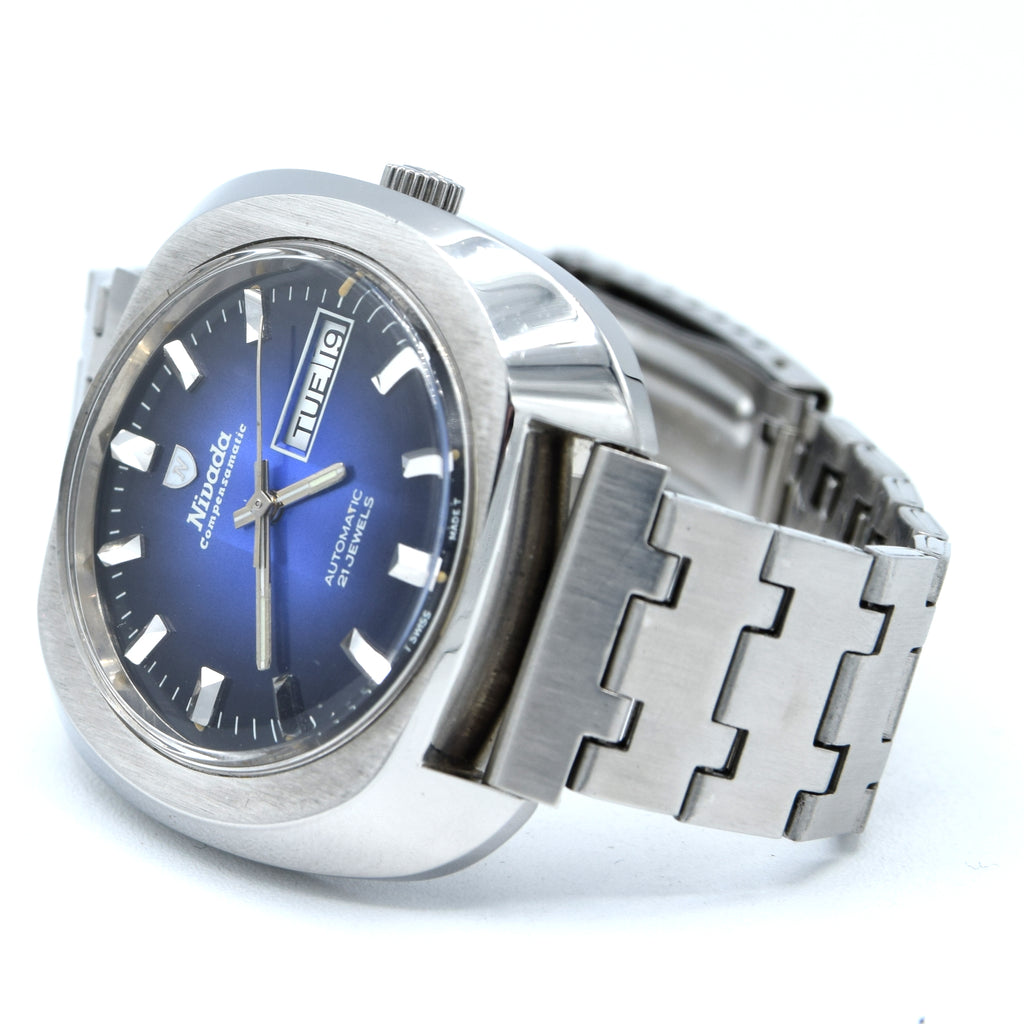 1970s Nivada Compensamatic Fumé blue Day Date automatic watch in Stain ...